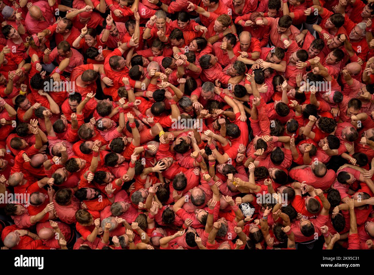 People of Colla Jove dels Xiquets de Valls celebrating after completing ...