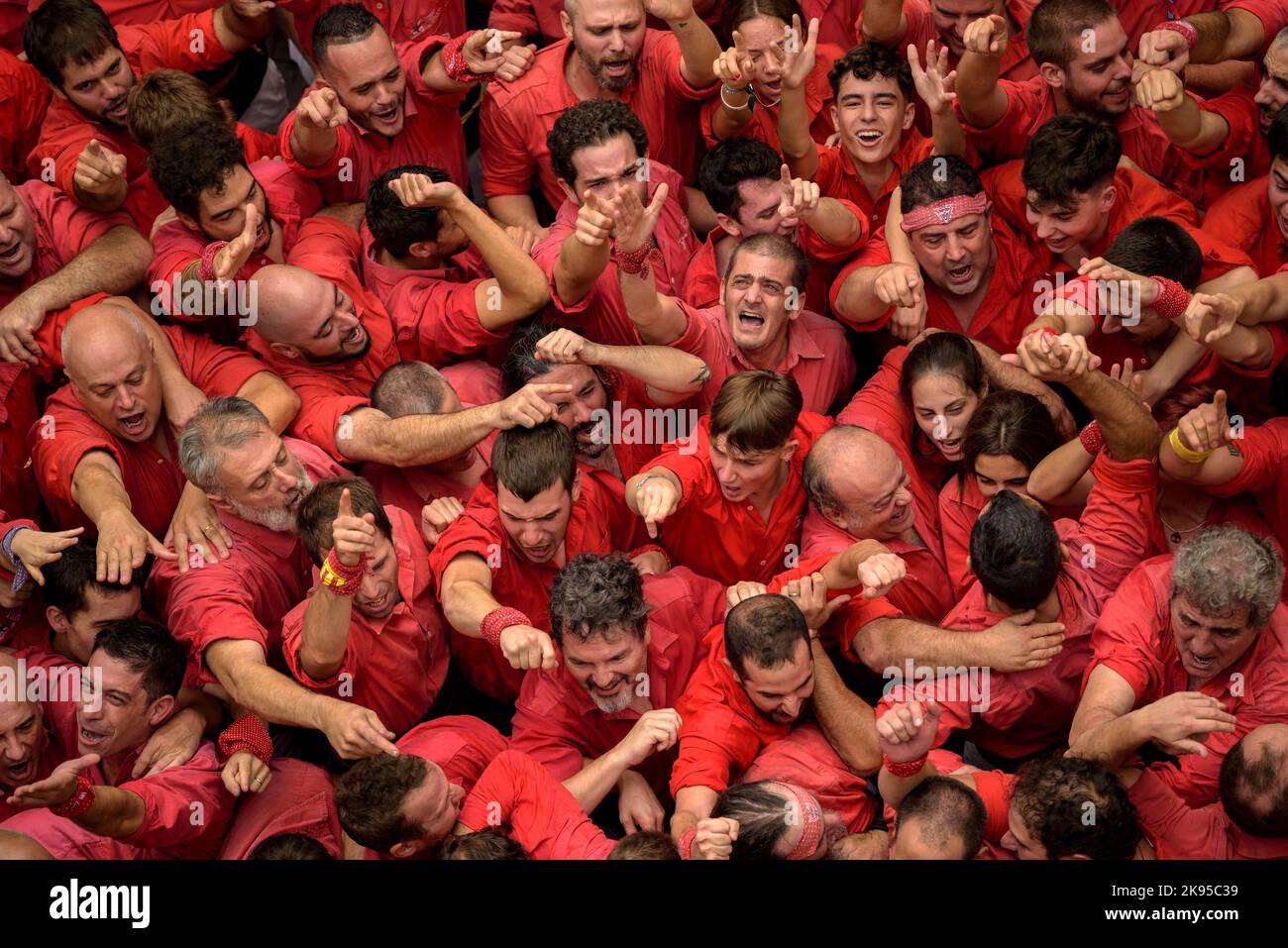 People of Colla Jove dels Xiquets de Valls celebrating after completing ...