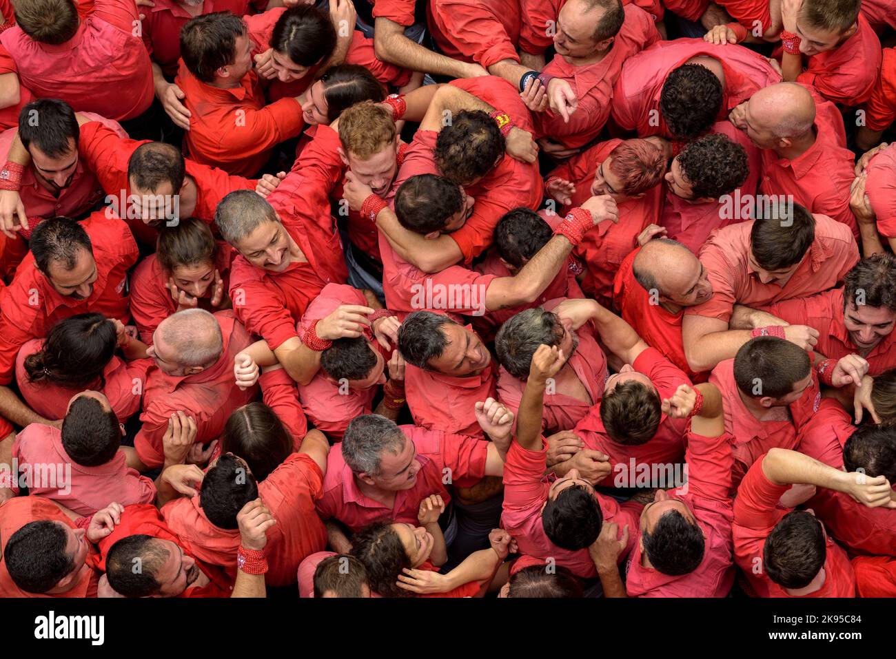 People of Colla Jove dels Xiquets de Valls celebrating after completing ...