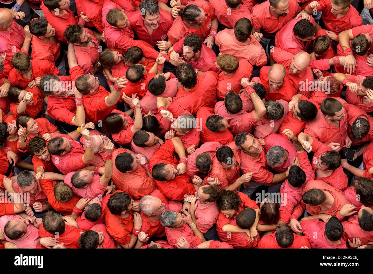 People of Colla Jove dels Xiquets de Valls celebrating after completing ...