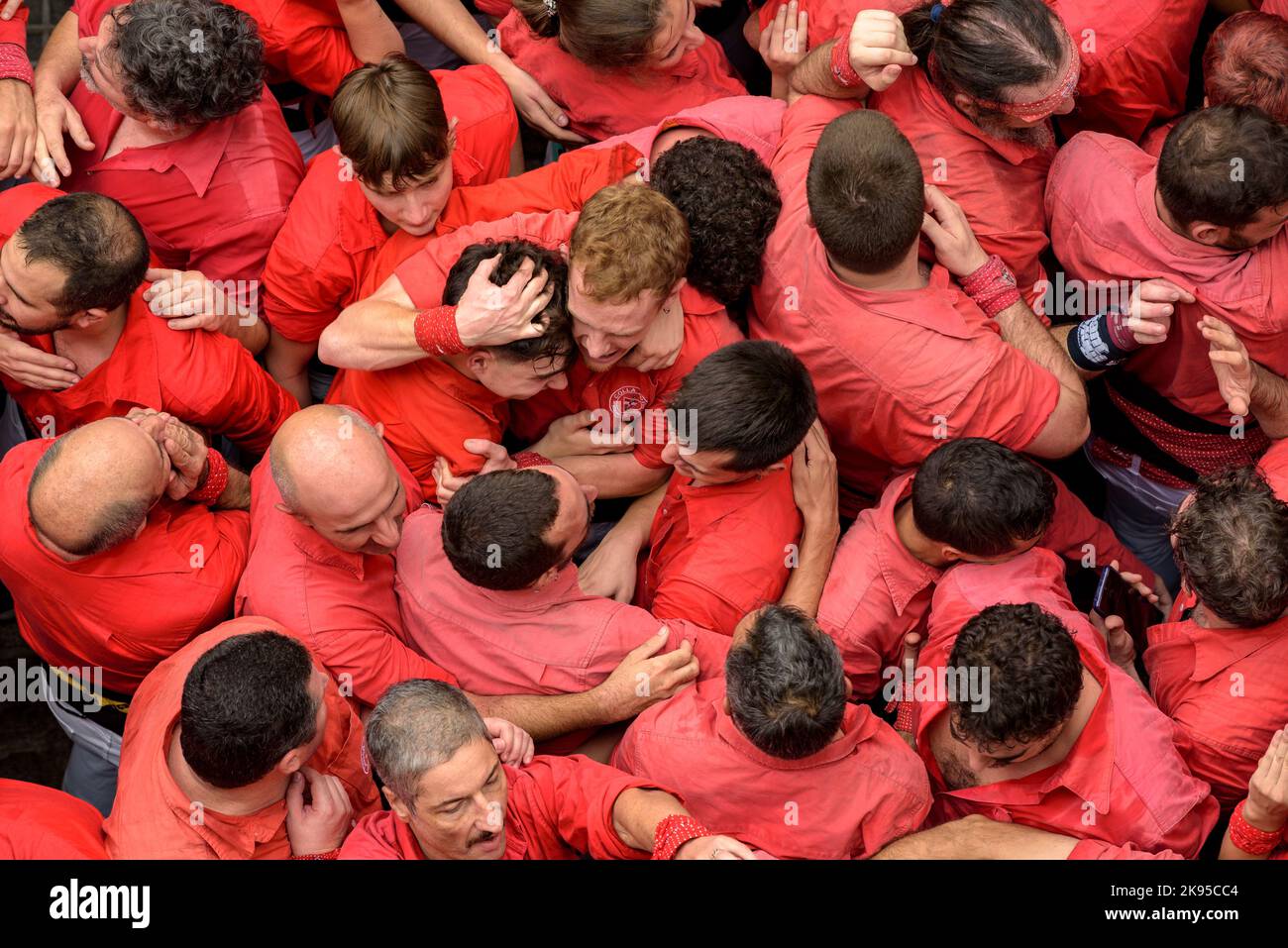 People of Colla Jove dels Xiquets de Valls celebrating after completing ...