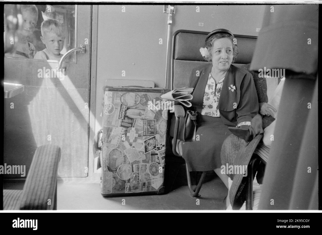 Traveling in 2nd class Stock Photo - Alamy