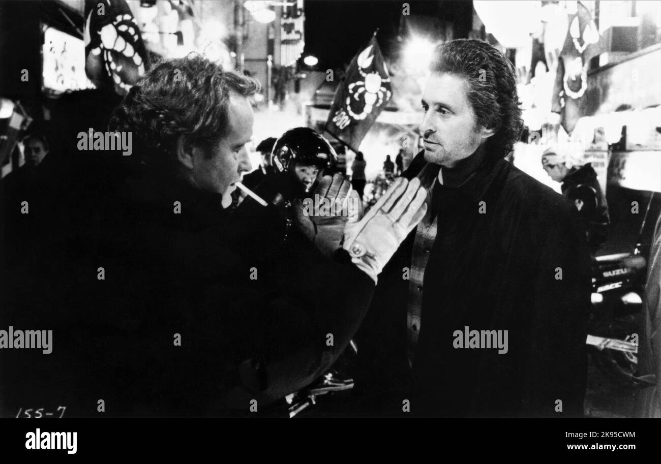 Director RIDLEY SCOTT and MICHAEL DOUGLAS on set location candid during ...