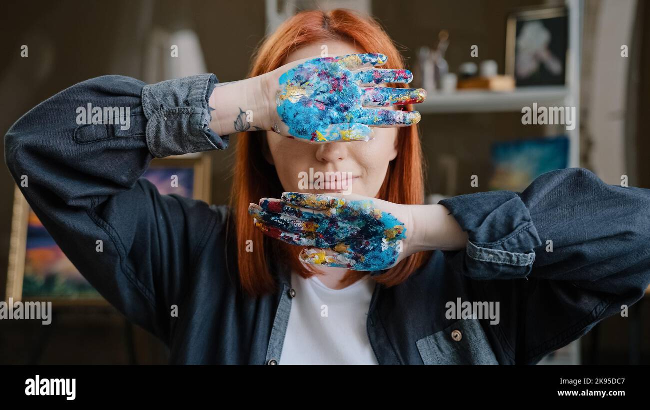 Red-haired Caucasian woman lady girl painter student of art school ...