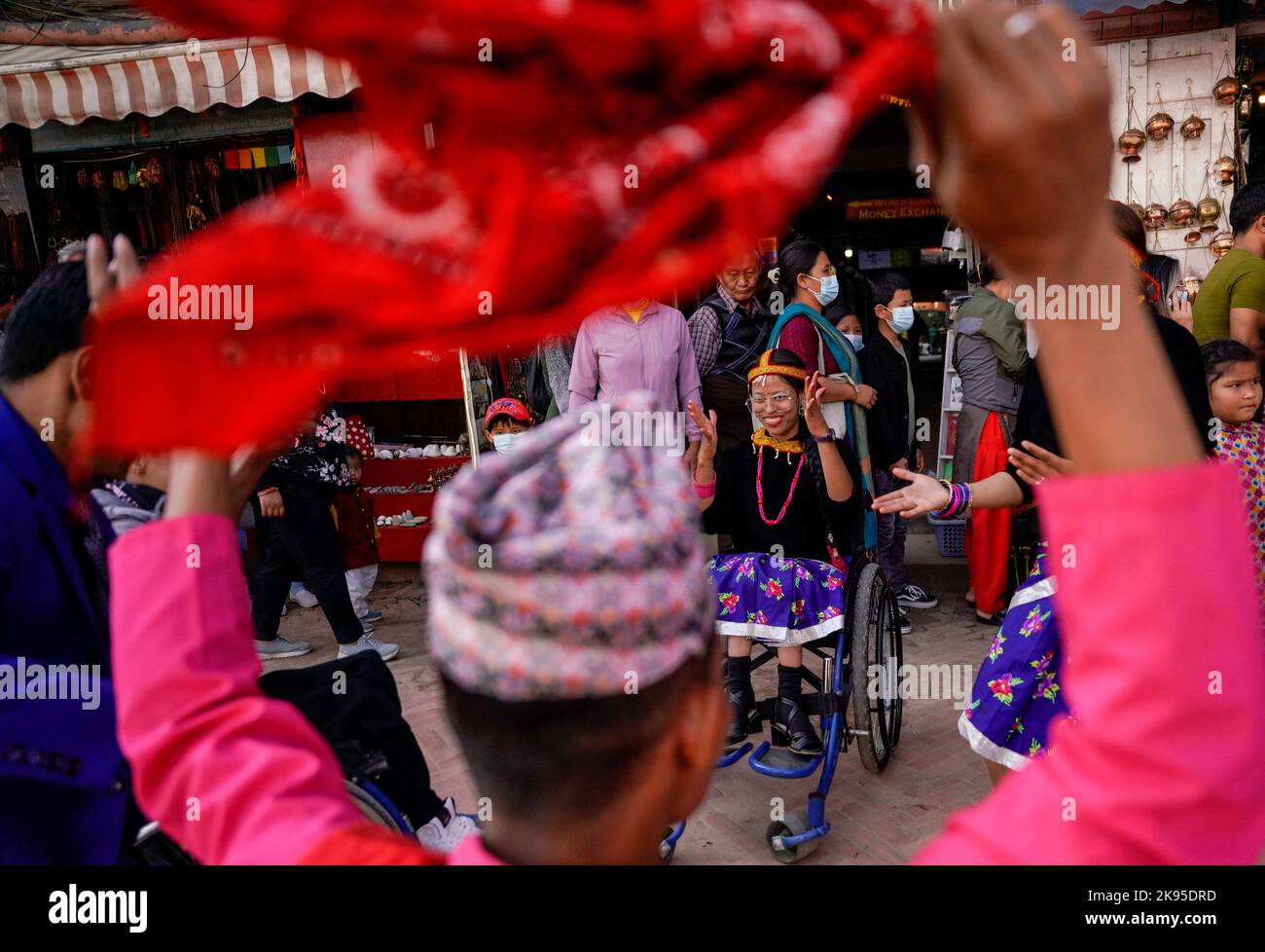 Persons with disabilities and impairments dance and sing to the Deusi ...