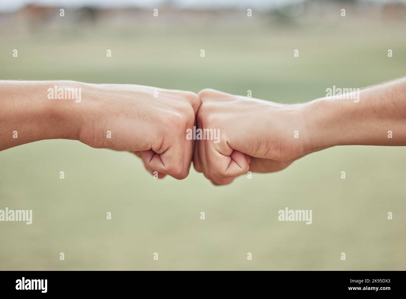 Fist bump, hands and people together to show support, solidarity and ...