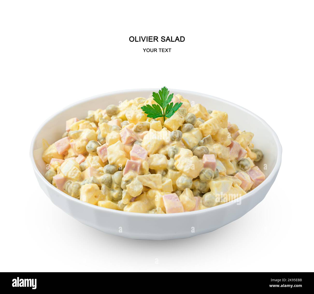 The traditional olivier salad with fresh herbs is isolated on a white ...