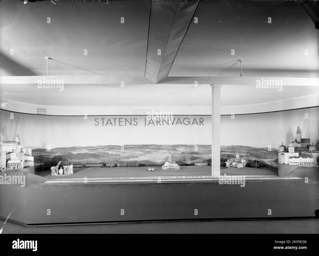 The Stockholm Exhibition 1930. A model railway on a round track with ...