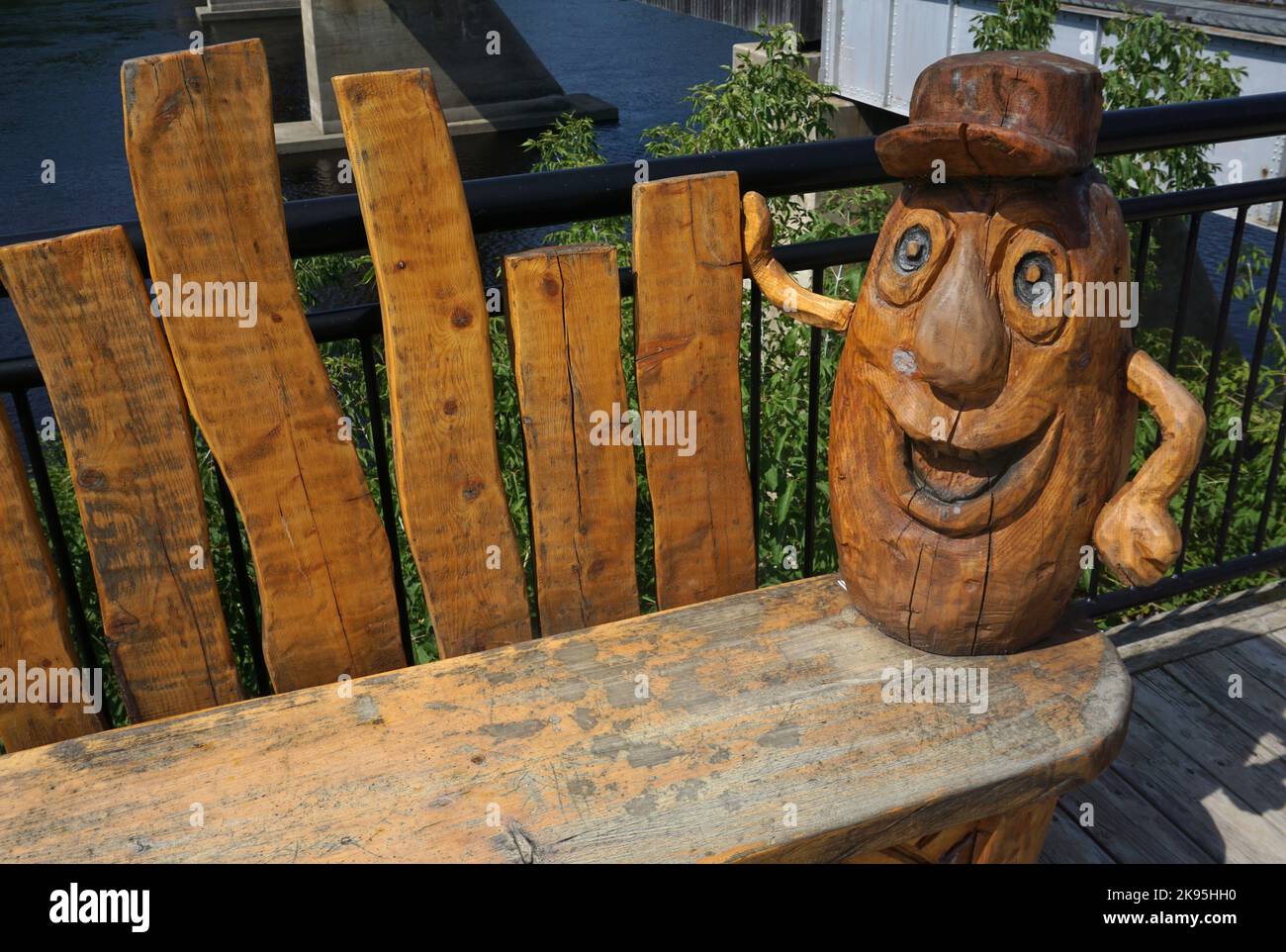 Bench in Florenceville with potato carving Stock Photo - Alamy
