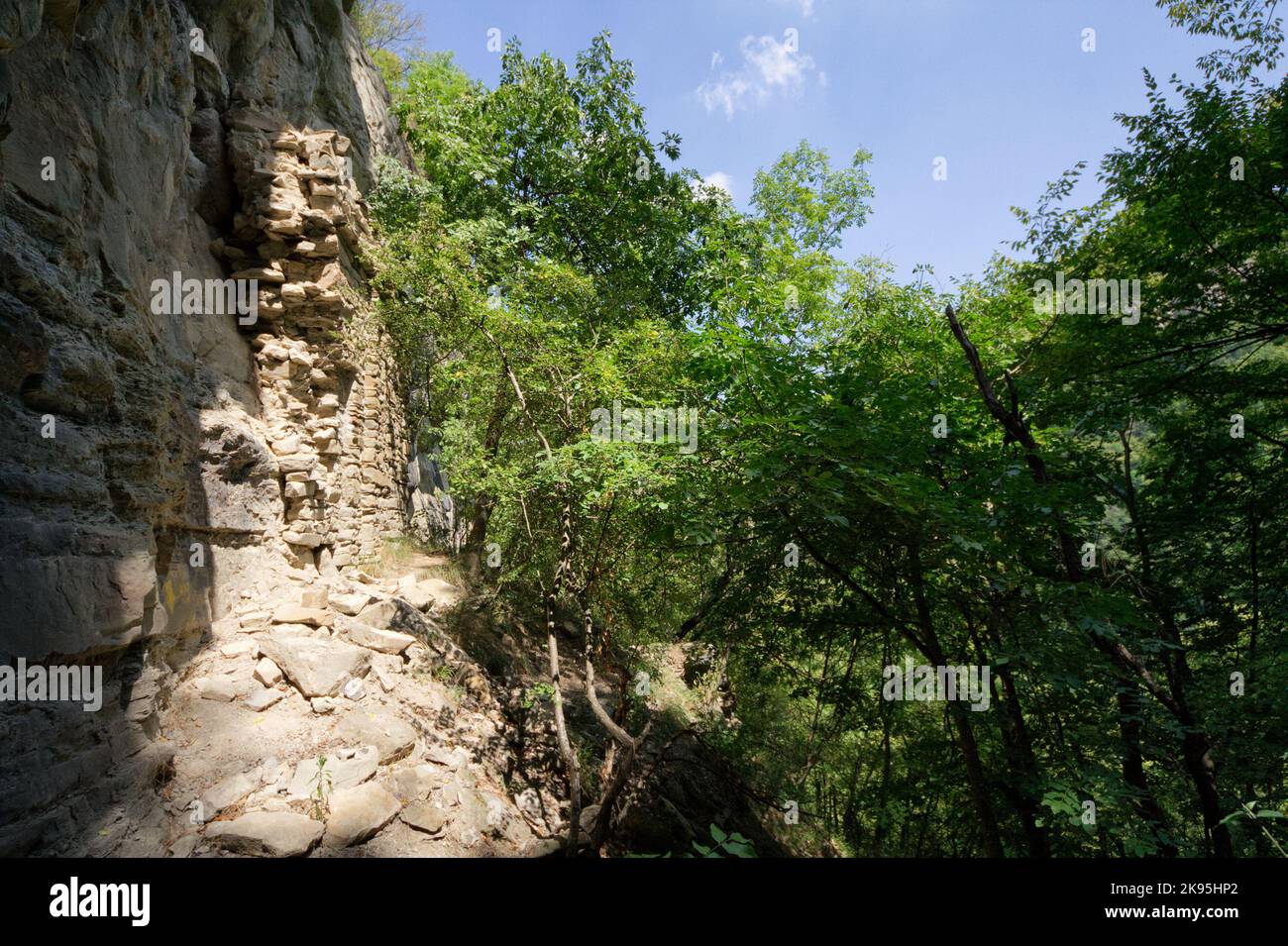 Remains of the collapsed Saint Michael’s Church near the cave where ...