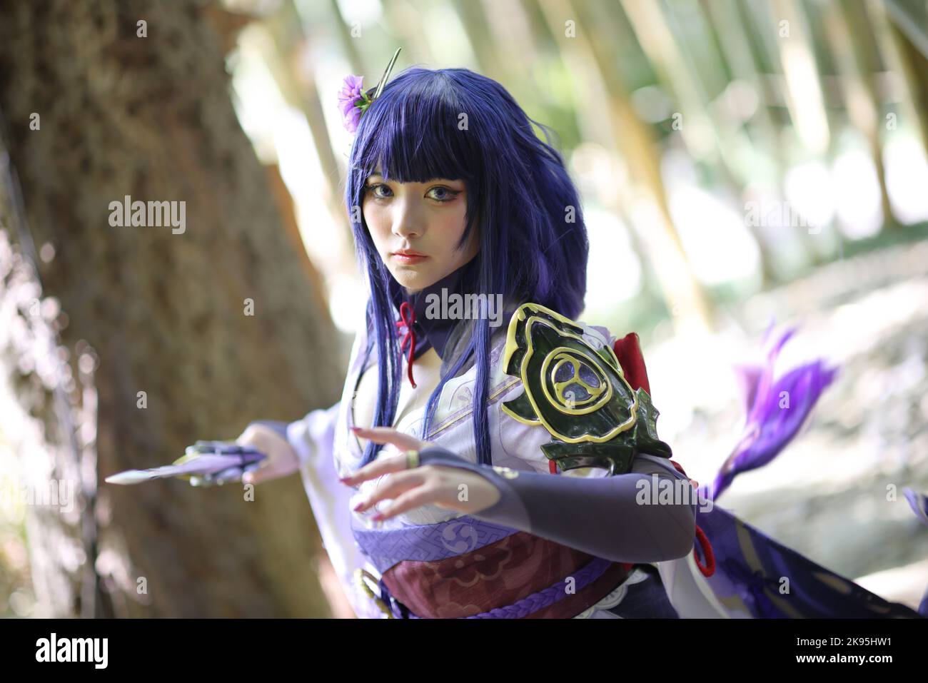 Portrait of a beautiful young woman game cosplay with samurai dress ...
