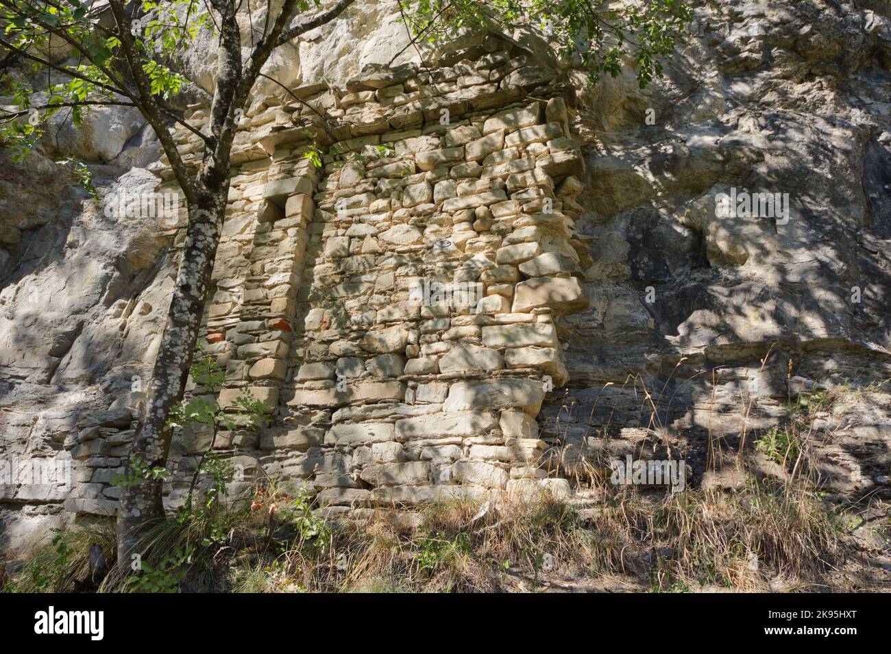 Remains of the collapsed Saint Michael’s Church near the cave where ...