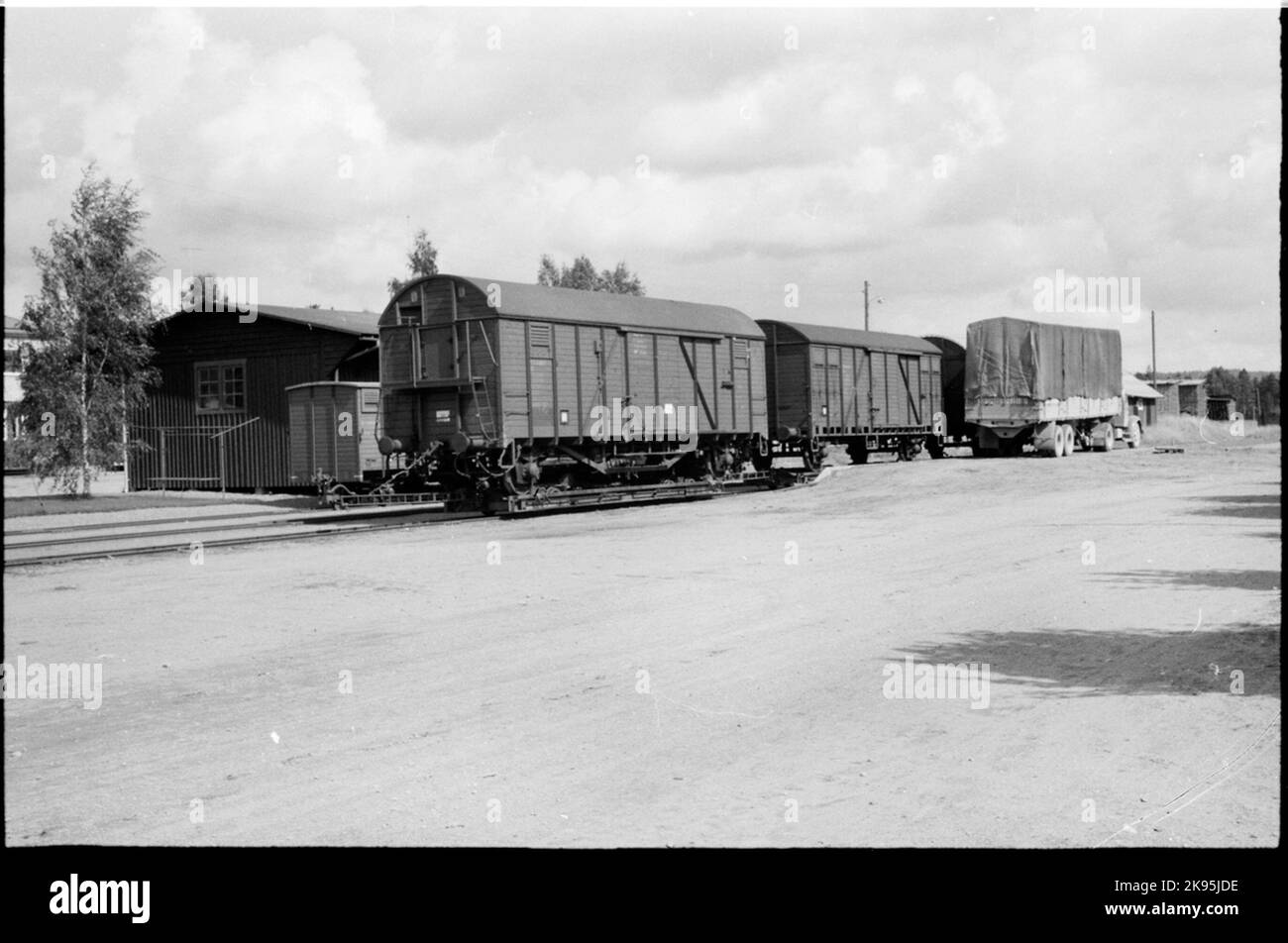Freight wagons on transfer trolleys at Järnforsen station Stock Photo ...