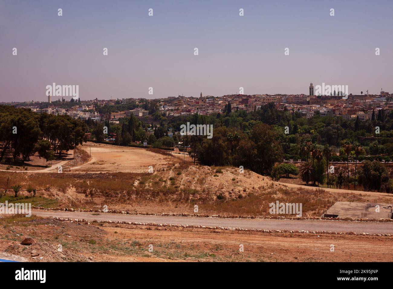 A beautiful view of the Meknes city buildings and trees in Morocco ...