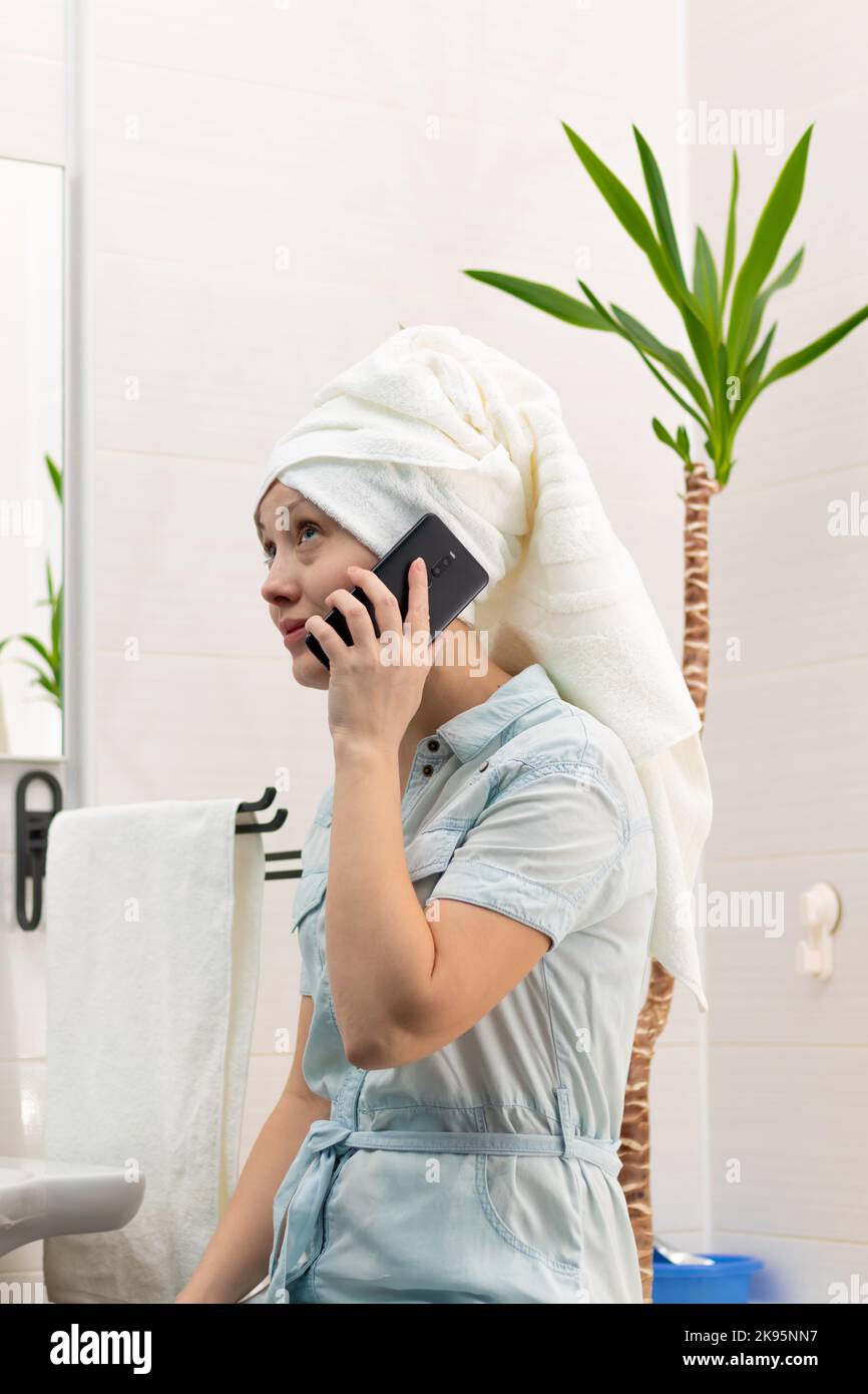Woman using toilet hi-res stock photography and images - Alamy