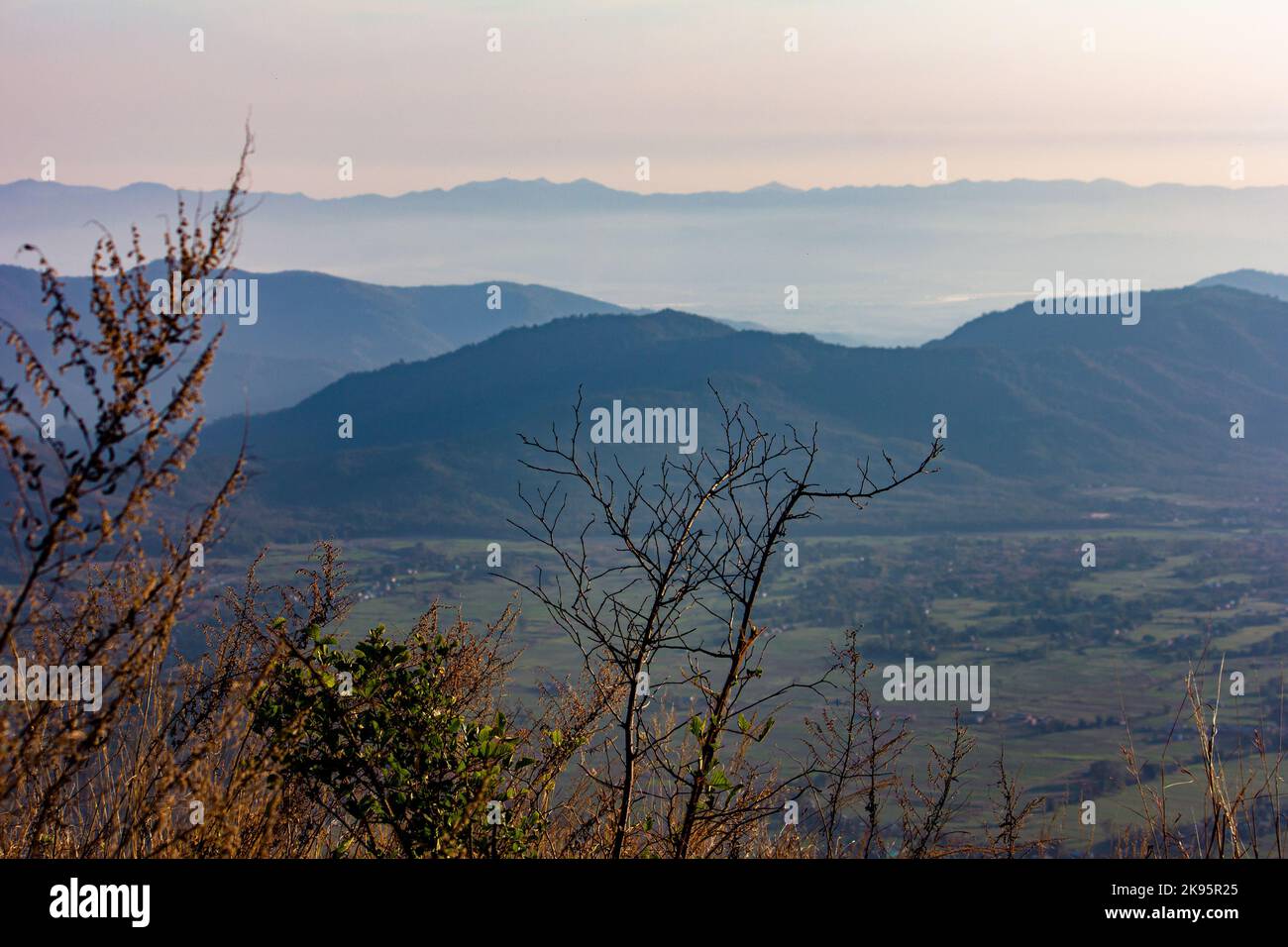A morning view of mountain layers and valley Stock Photo - Alamy