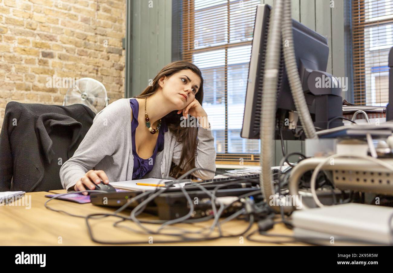 The Media Agency: Creative Professional. A female office worker ...