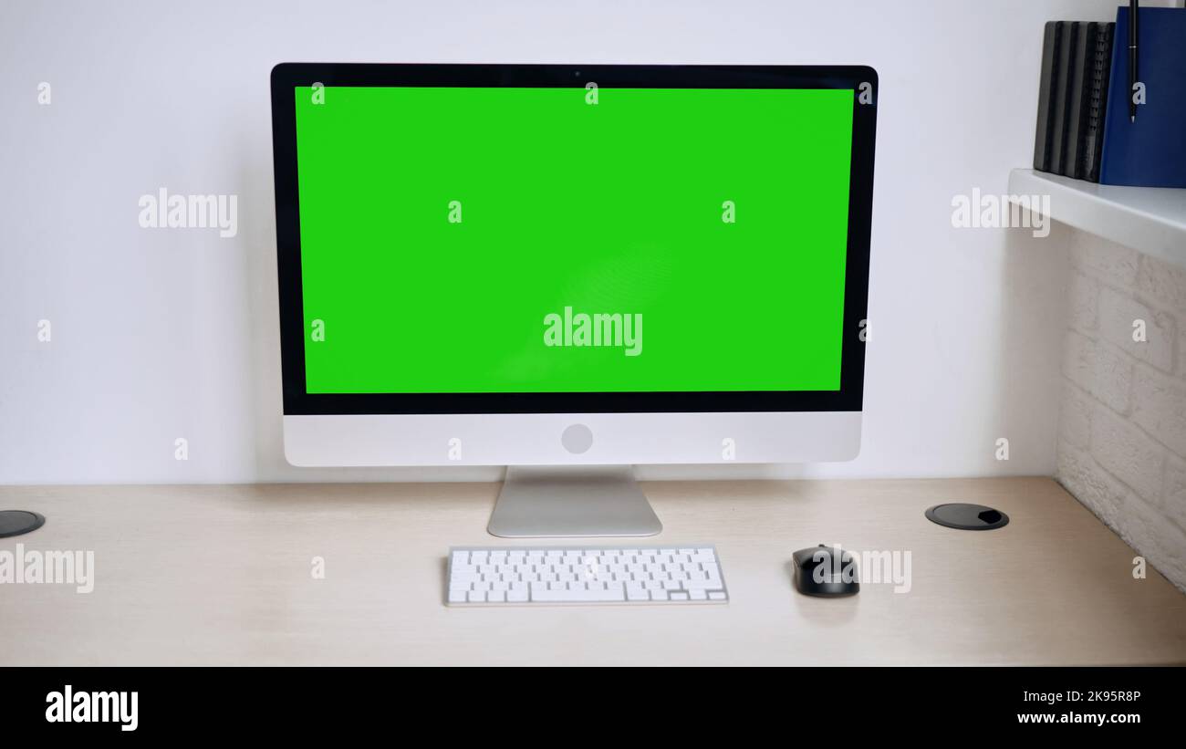 A computer display with a greenscreen Stock Photo - Alamy