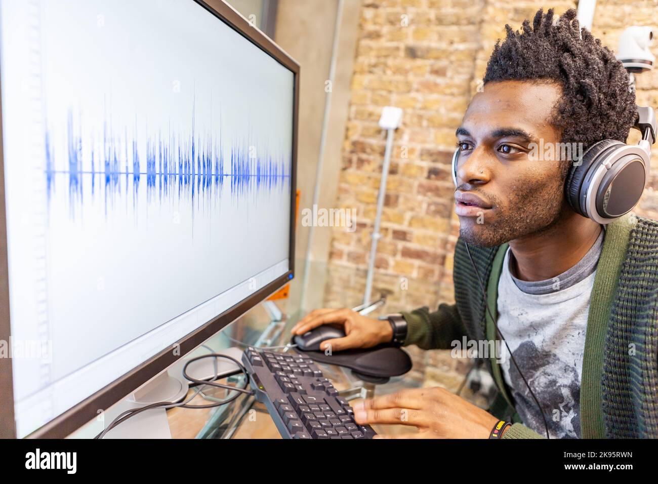 The Media Agency: Waveform Editing. An audio engineer at work in a ...