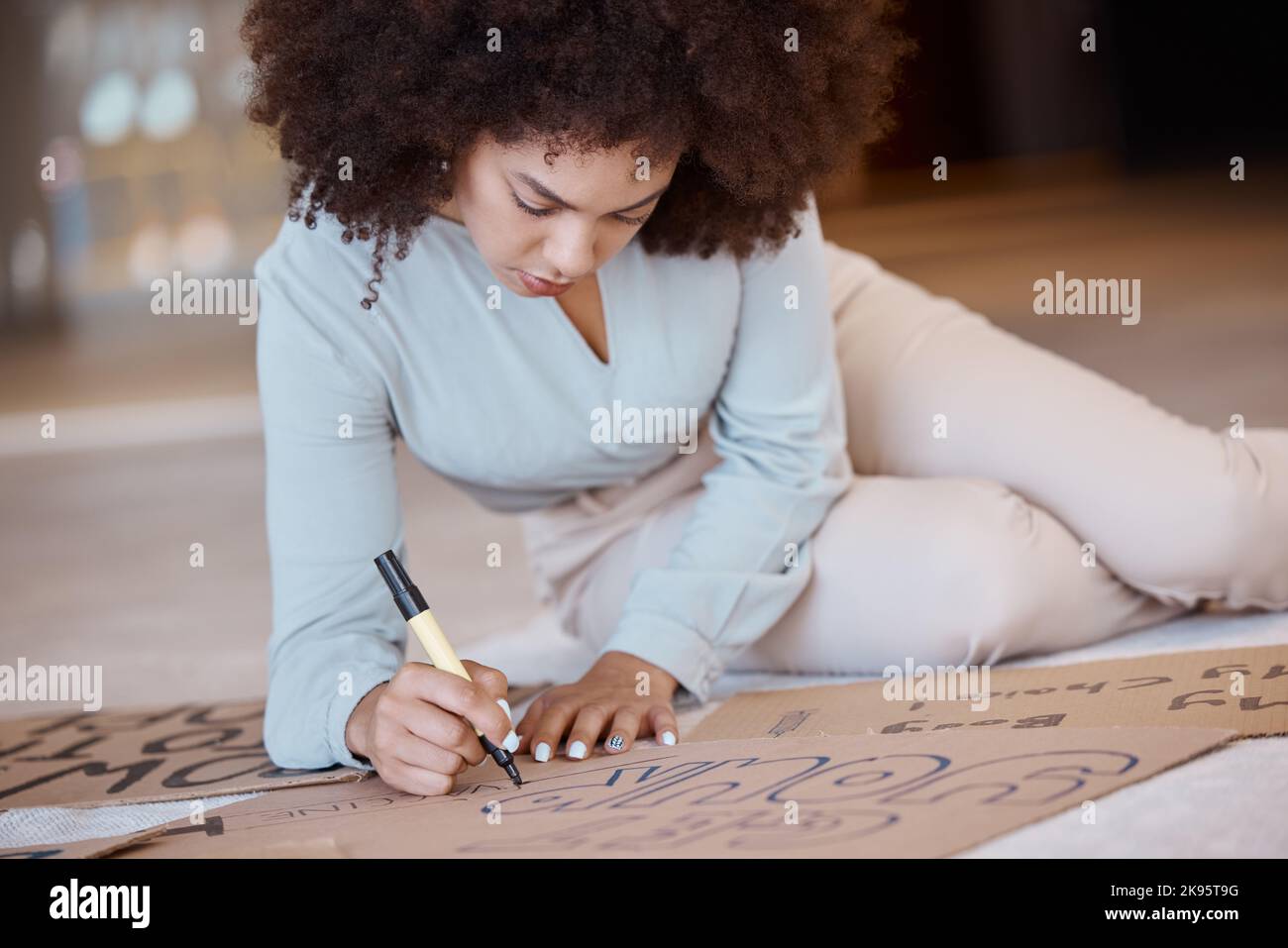 Black woman, poster and being creative for protest, solidarity with ...