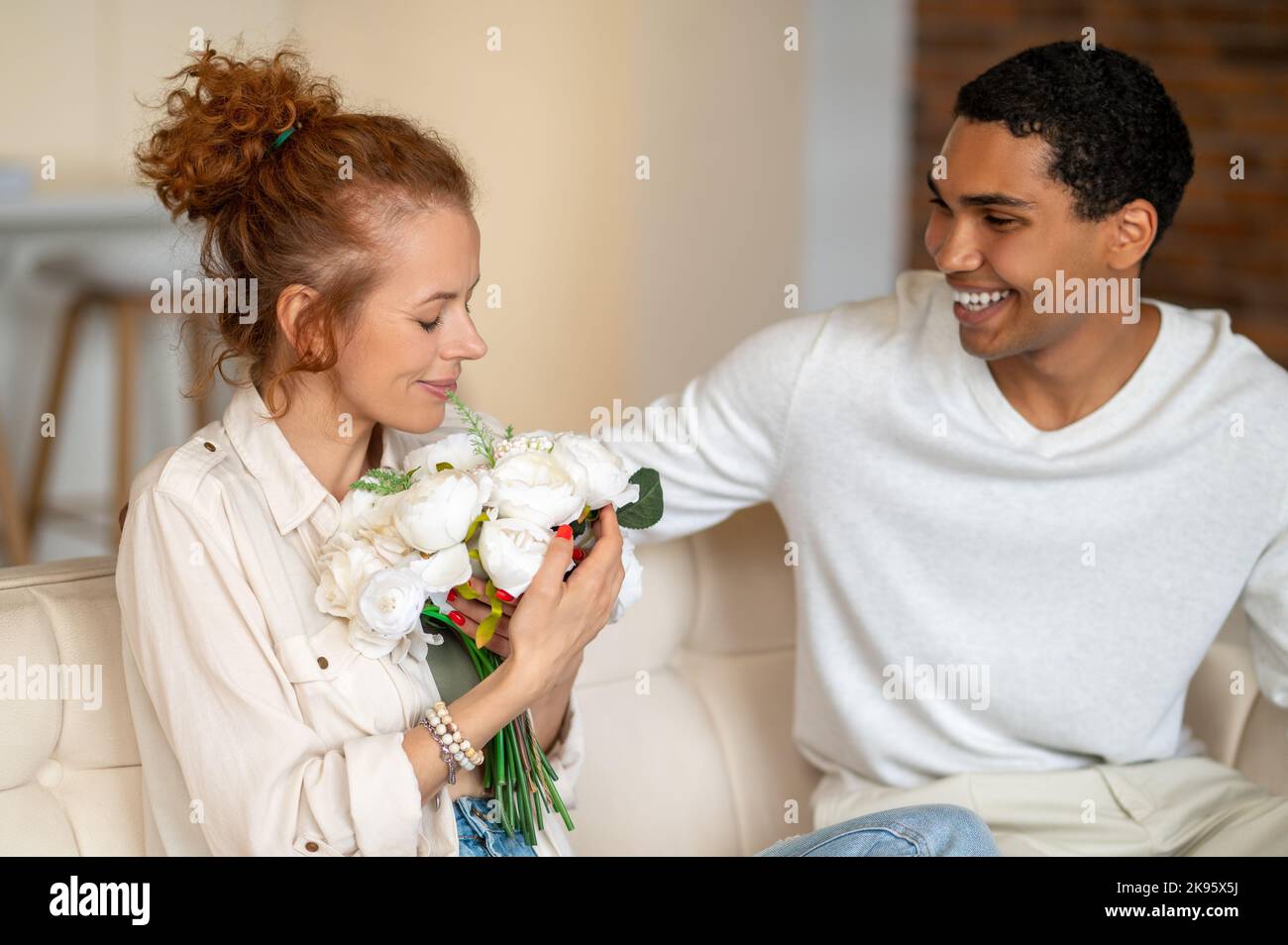African american man giving flowers hi-res stock photography and images ...