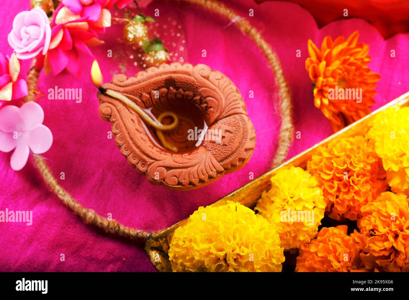 Diya and flower hi-res stock photography and images - Alamy