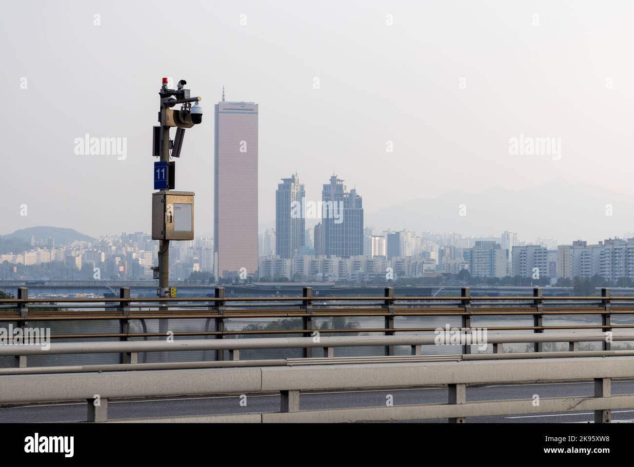 Security camera on the bridge watching after the car traffic, and speed ...