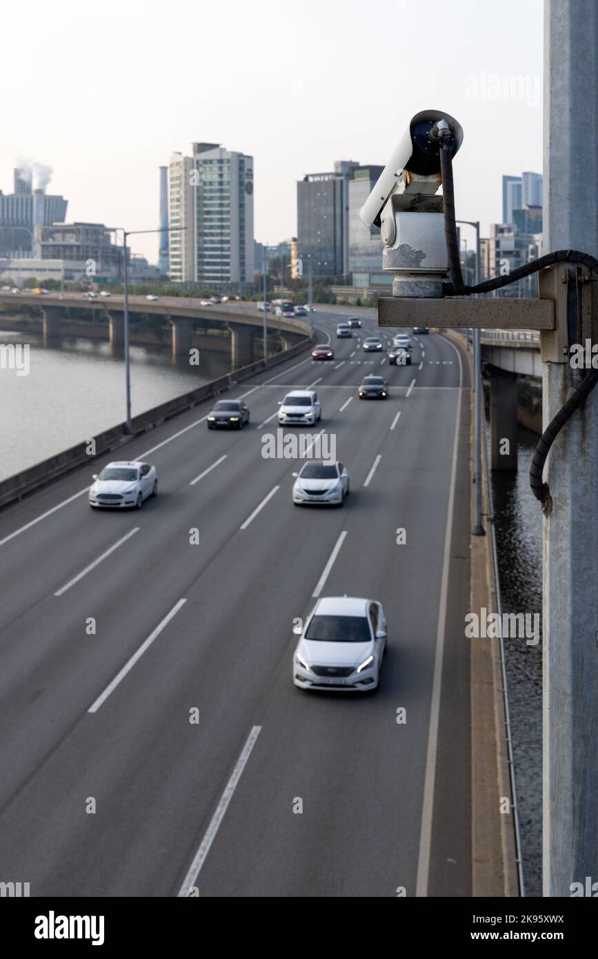 Security camera on the bridge watching after the car traffic, and speed ...