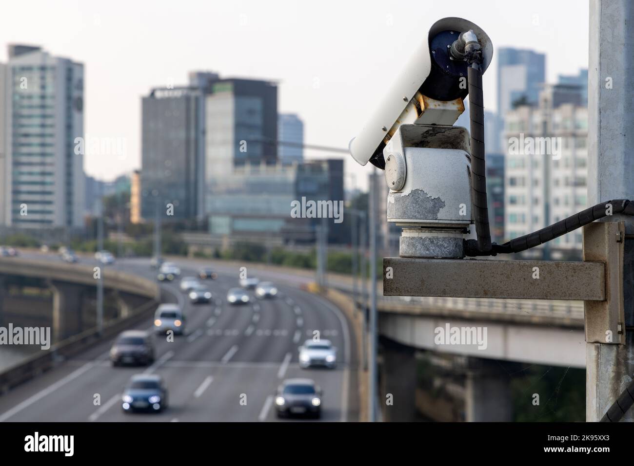 Security camera on the bridge watching after the car traffic, and speed ...
