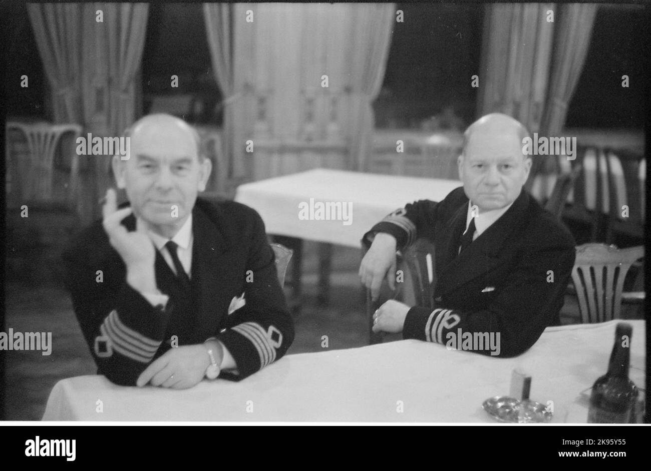 Naval captains by ferry Stock Photo - Alamy