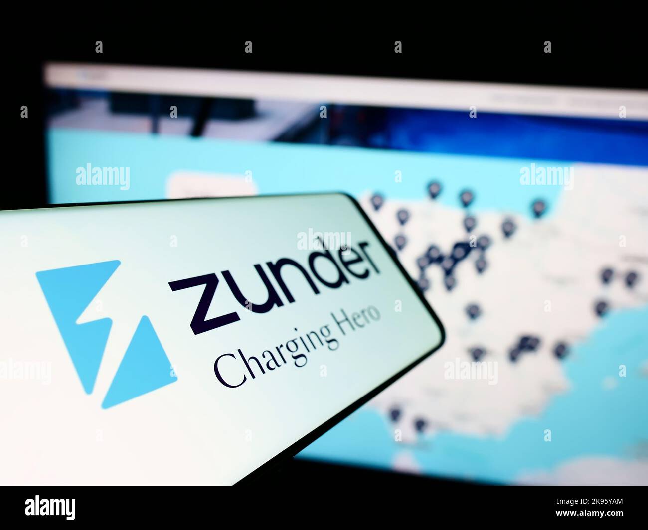 Smartphone with logo of Spanish company Grupo Easycharger sl (Zunder ...