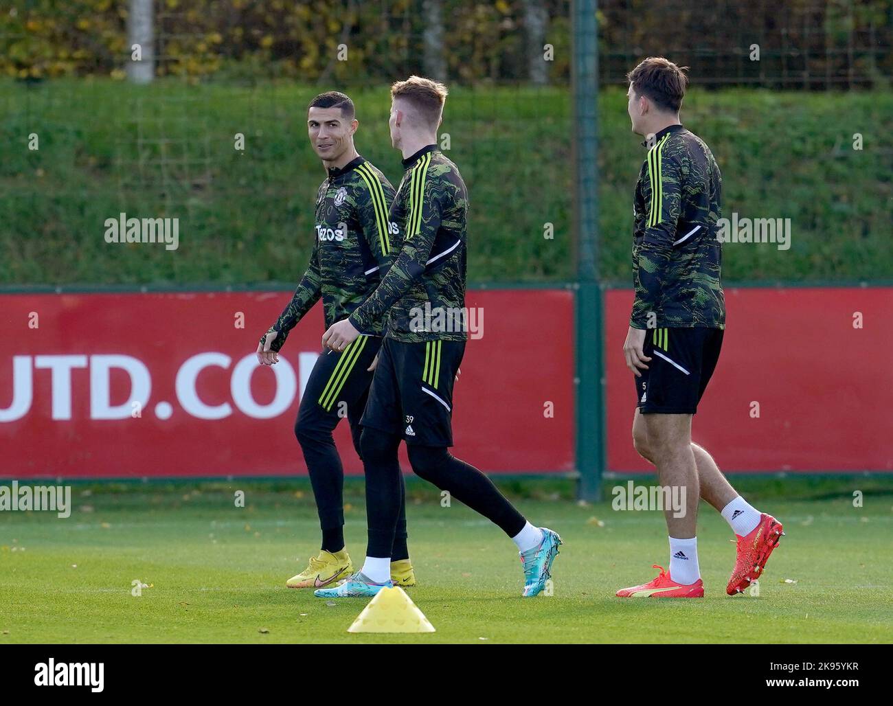 Manchester United's Cristiano Ronaldo (left) speaks to Scott McTominay ...