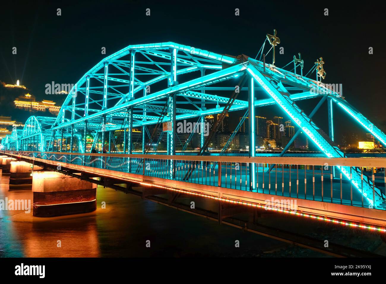 The Zhongshan bridge in Lanzhou, China at night with its blue glowing ...