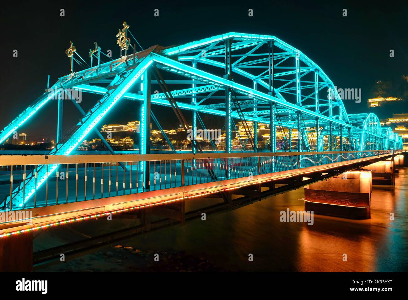 The Zhongshan bridge in Lanzhou, China at night with blue glowing ...