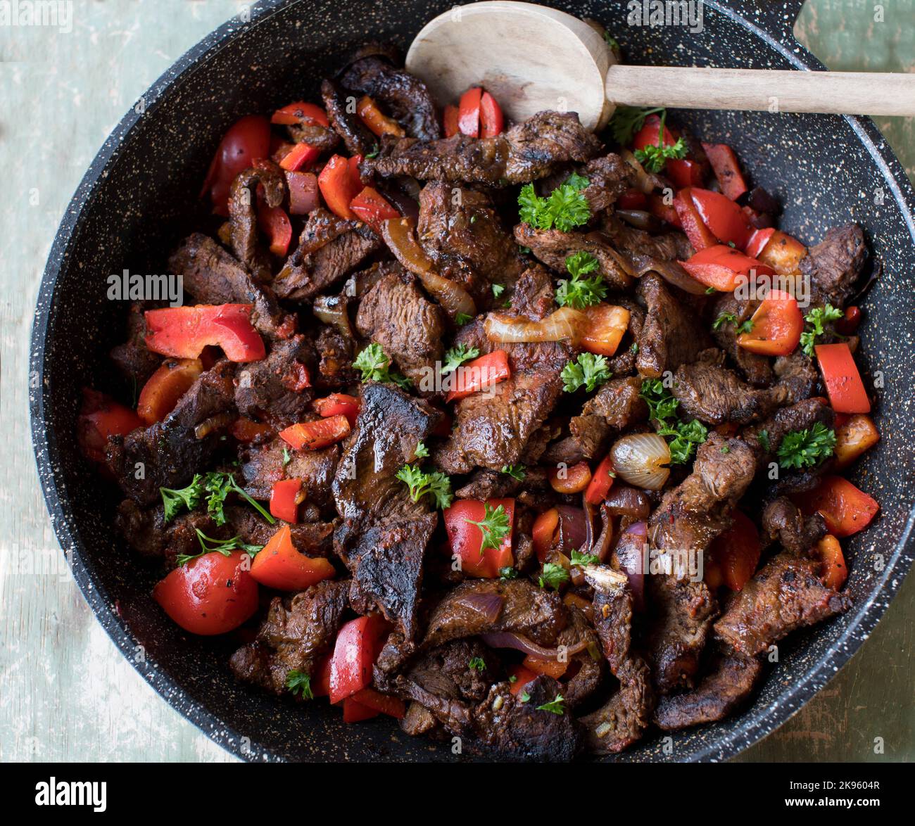 Beef stir fry with vegetables in a frying pan Stock Photo - Alamy
