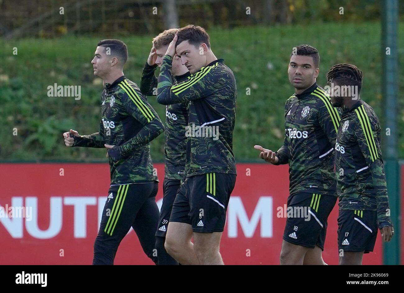 Manchester United's Cristiano Ronaldo (left), Harry Maguire (centre ...