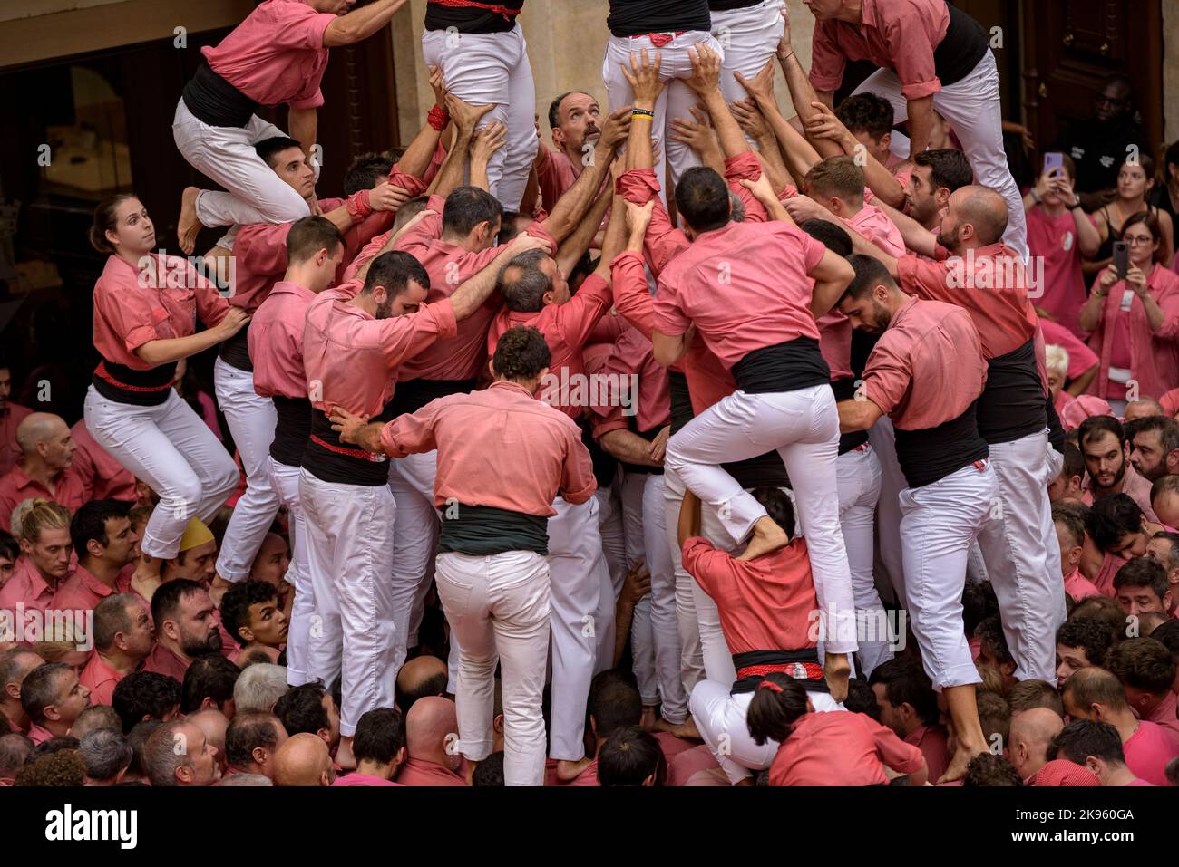 Raising a Castell (human tower) "3 of 9" of the Colla Vella dels ...