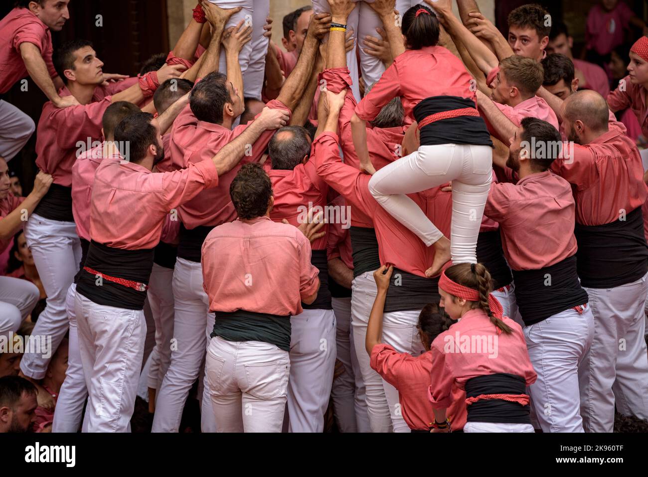Raising a Castell (human tower) "3 of 9" of the Colla Vella dels ...