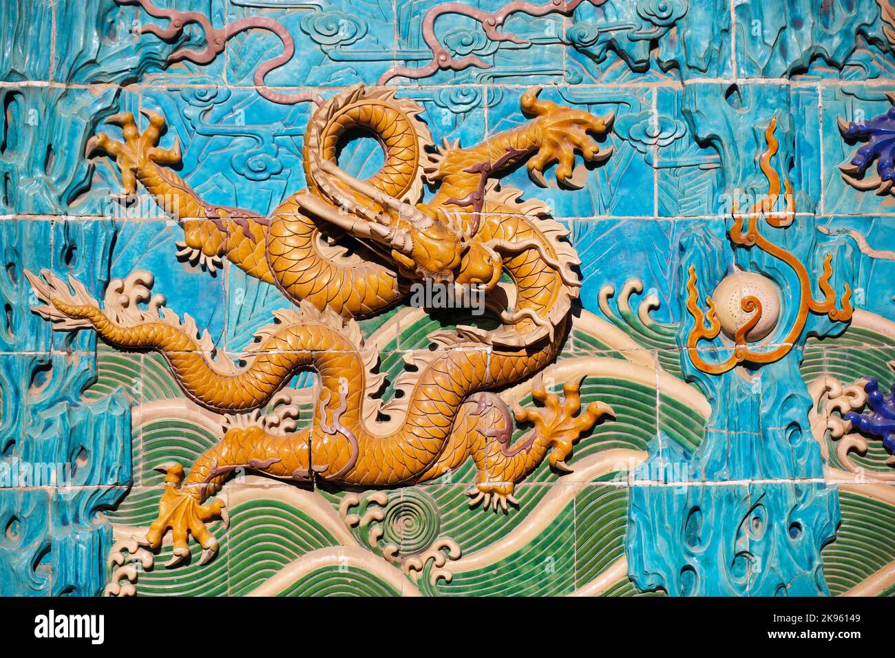 A part of the Nine Dragon Wall in Beihai Park, Beijing, China Stock ...
