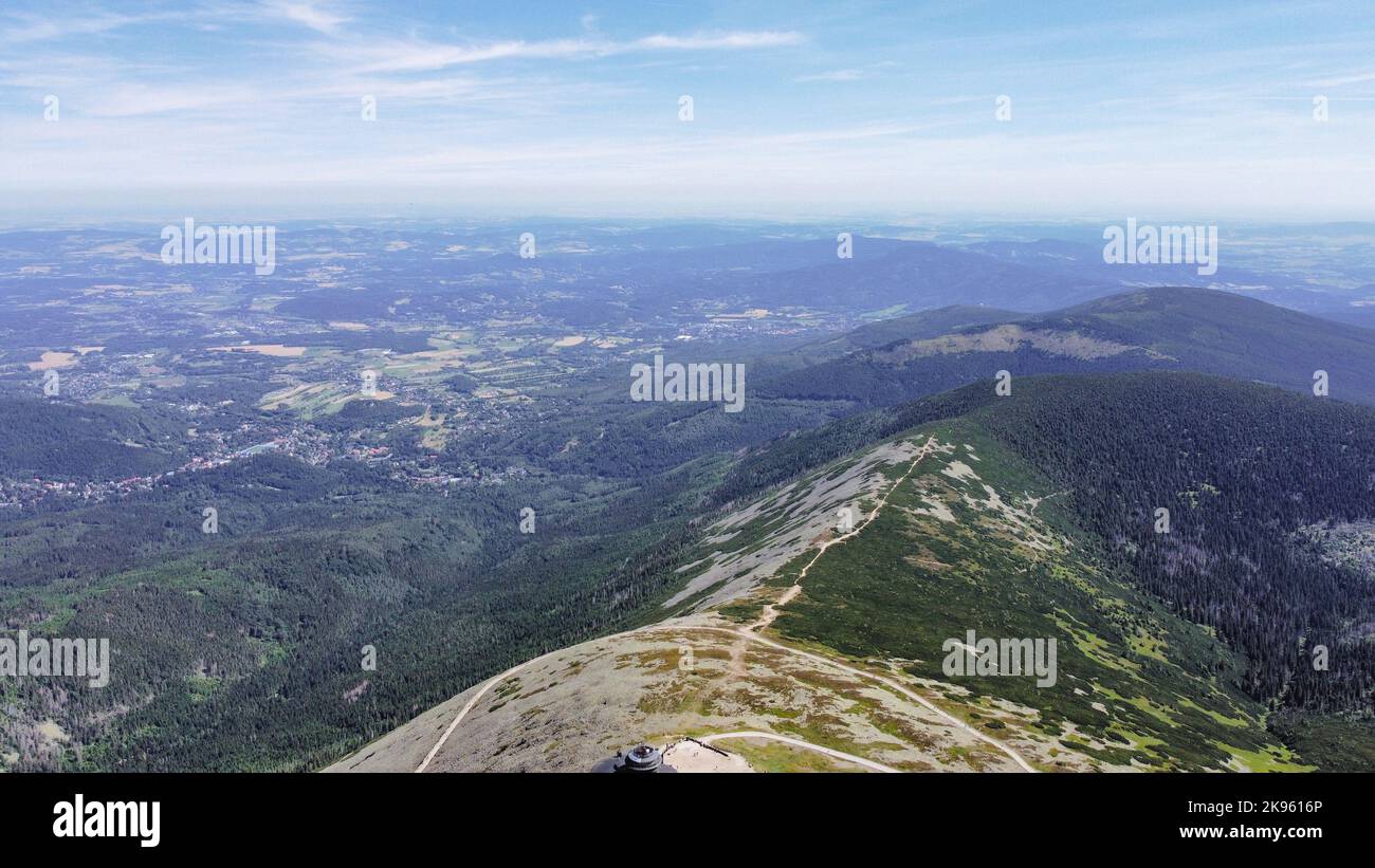 A drone shot of Karkonosze (Giant Mountains) range including Sniezka ...