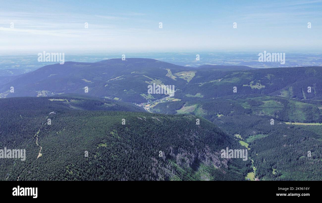 A drone shot of Karkonosze (Giant Mountains) range including Sniezka ...
