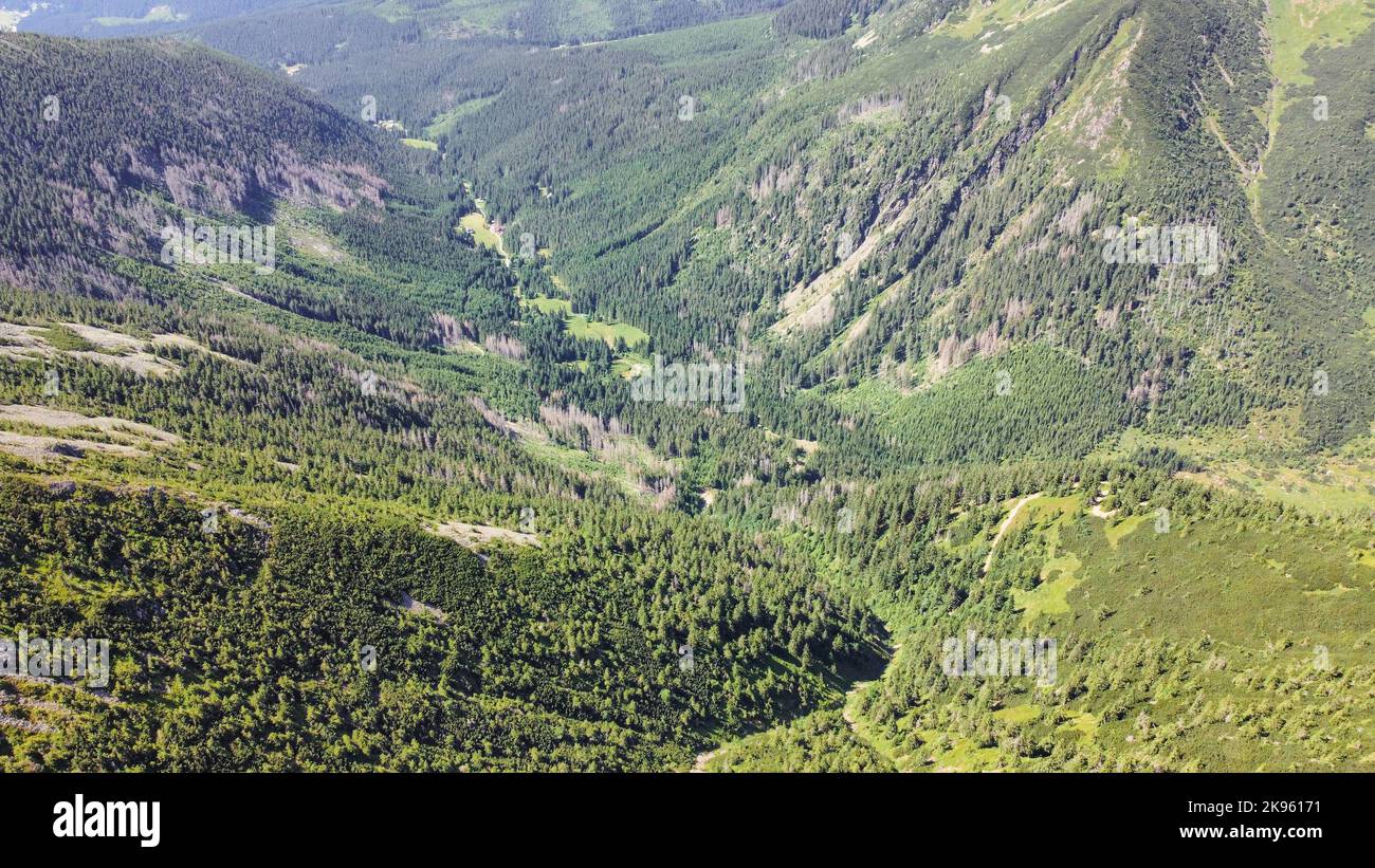 A drone shot of Karkonosze (Giant Mountains) range including Sniezka ...