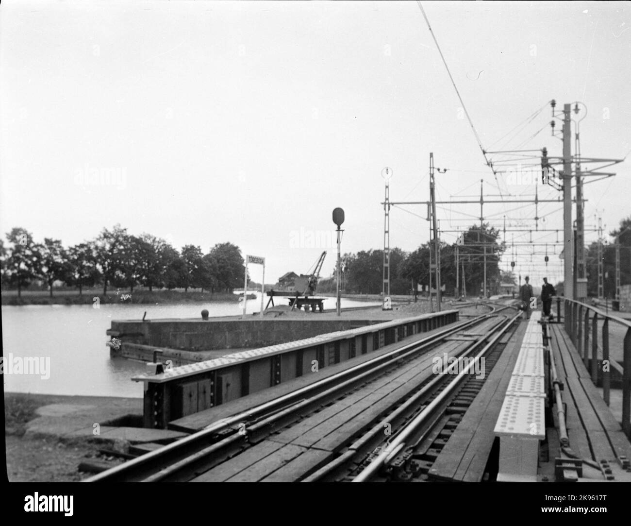 Railway crossing the canal Black and White Stock Photos & Images - Alamy