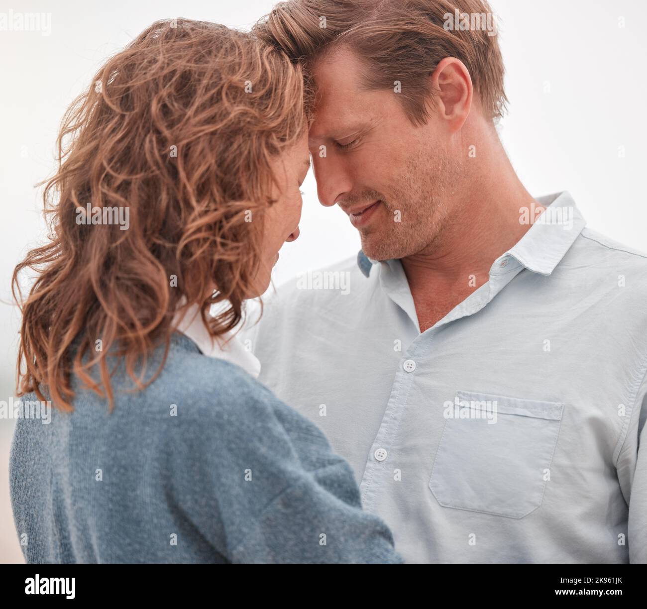 Happy couple, love and commitment while outdoor in nature sharing a ...