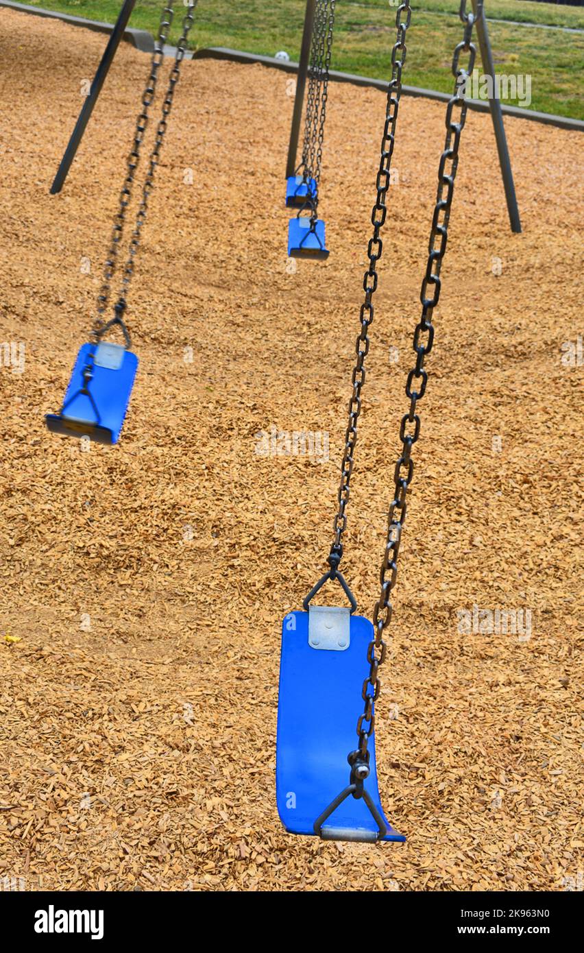 Metal swings hi-res stock photography and images - Alamy