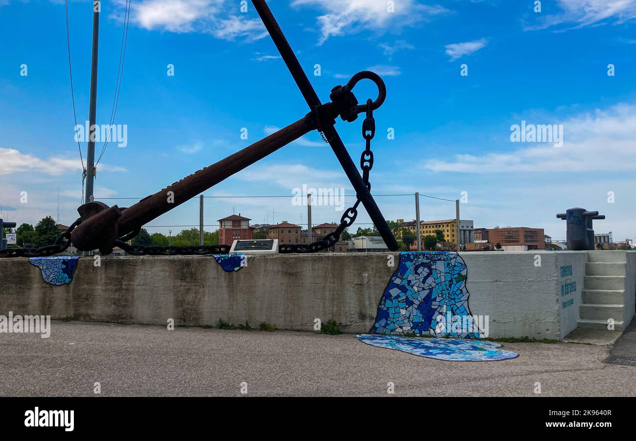 An aerial view of anchor in dock surrounded by buildings and water in ...