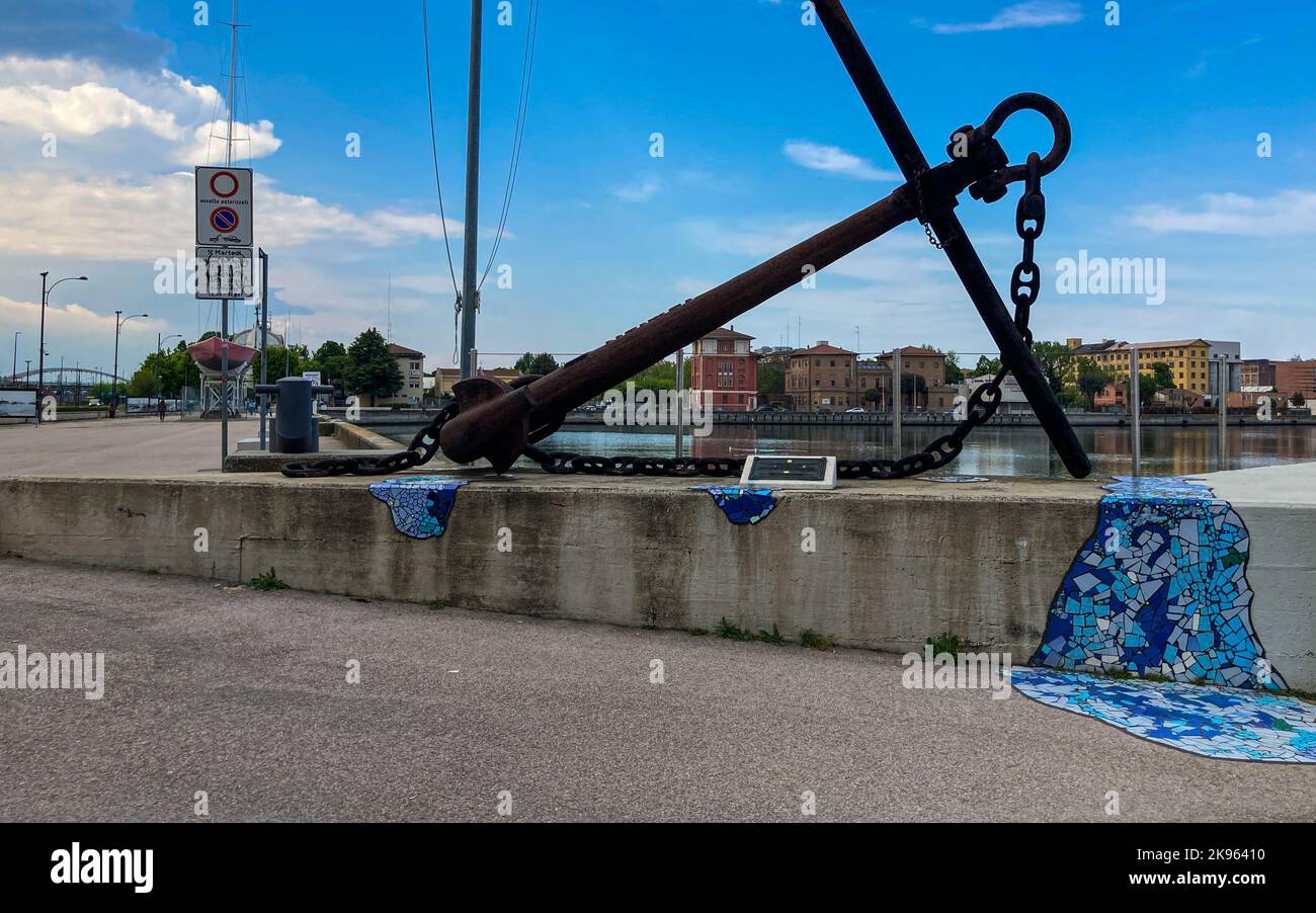 An aerial view of anchor in dock surrounded by buildings and water in ...
