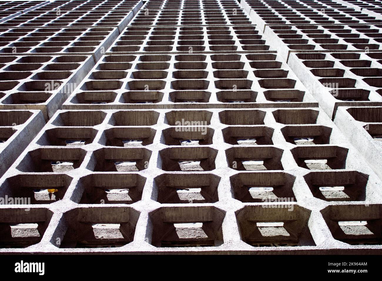A low-angle shot of a building's facade with cinder block panels Stock ...