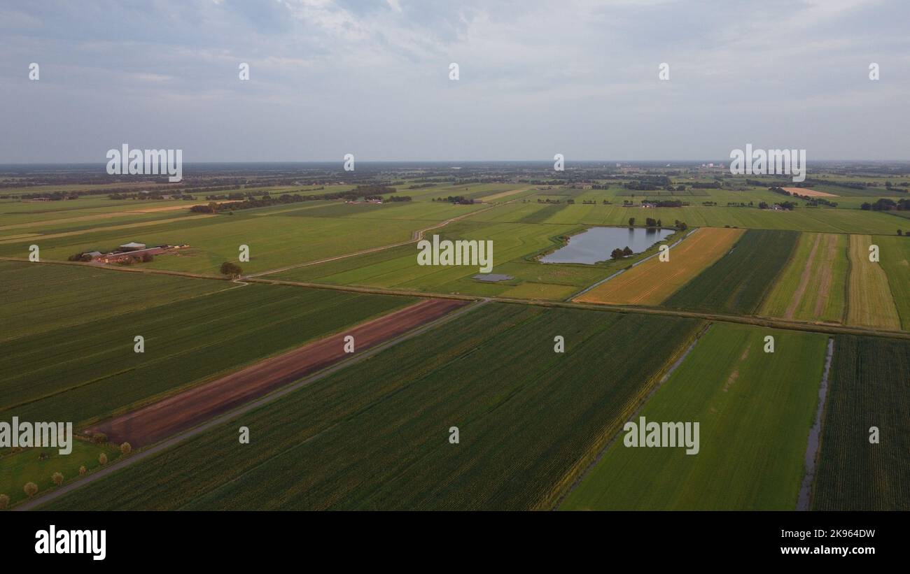 An aerial slow movement around agricultural fields Stock Photo - Alamy