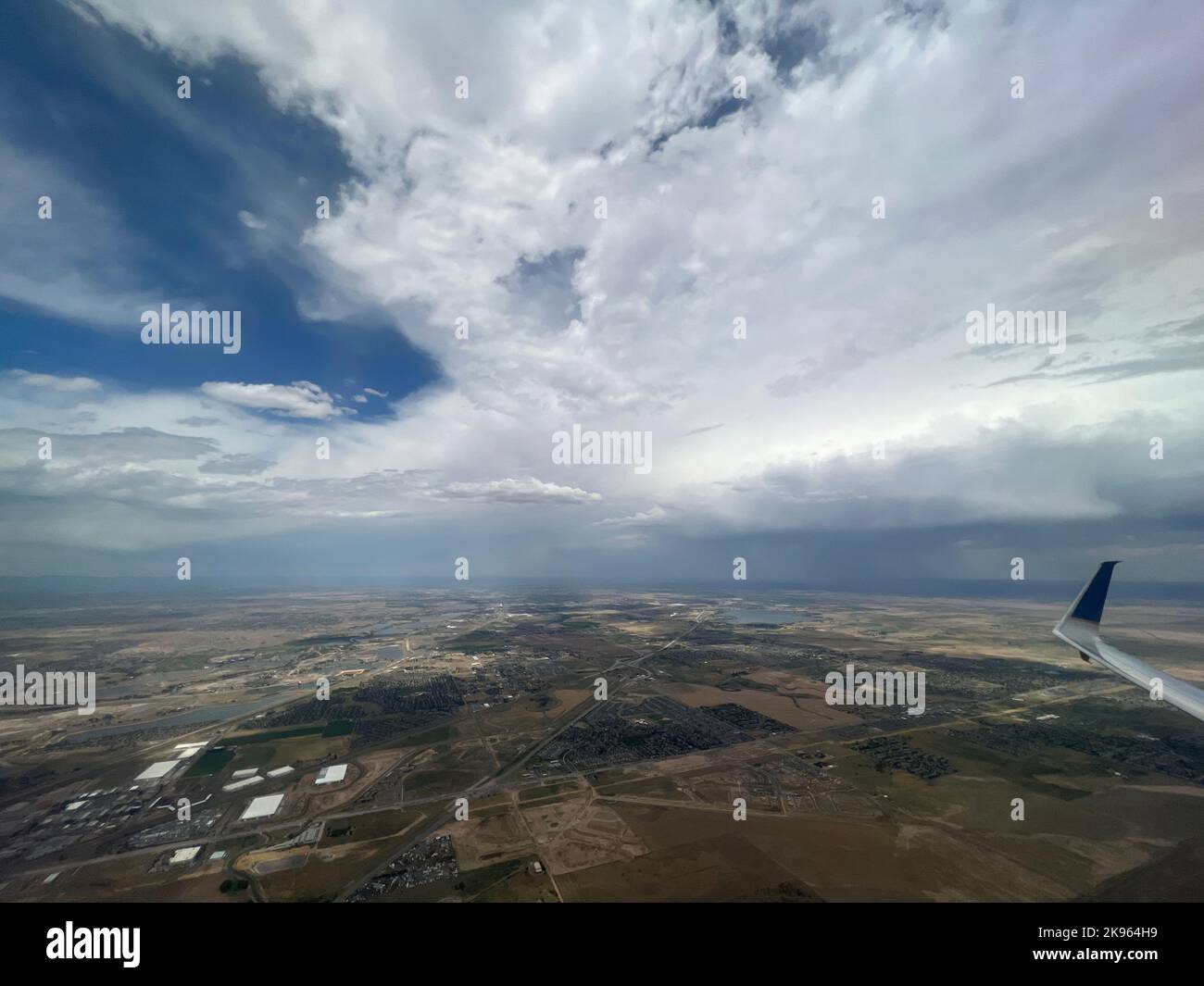 An aerial view of from plane to landscape with buildings Stock Photo ...